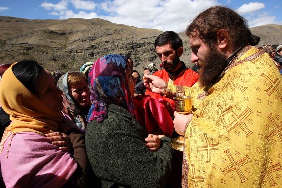 Orthodox Priest Gives Communion Belivers Near Editorial Stock Photo ...
