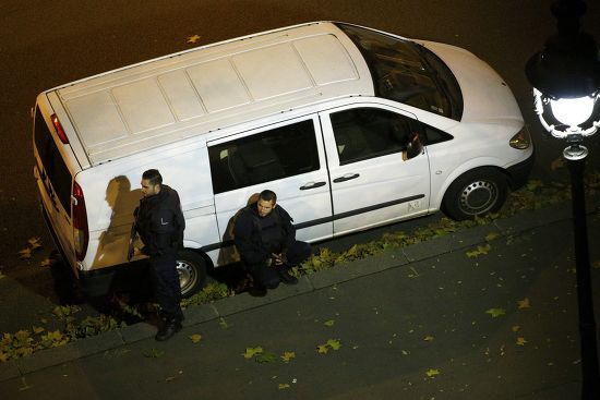 French Police Officers Take Cover Outside Editorial Stock Photo - Stock ...