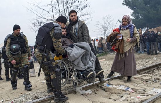 Macedonia Police Officers Helps Refugee Man Editorial Stock Photo ...