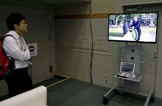 Japanese Journalist L Watches Tv Broadcast Editorial Stock Photo ...