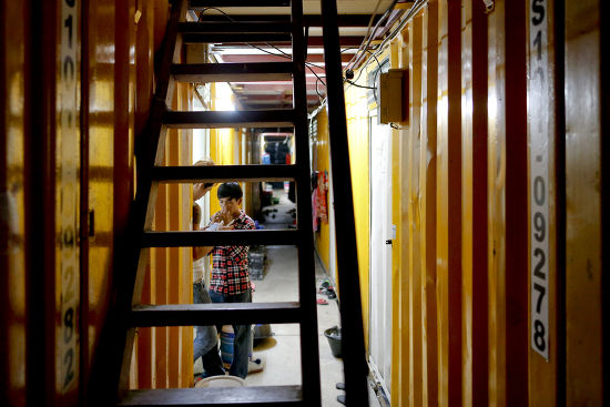 Migrant Workers Chat Outside Container Unit Editorial Stock Photo ...