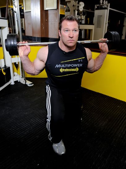 Bodybuilder Gunter Schlierkamp Demonstrates Lifting Technique Editorial ...