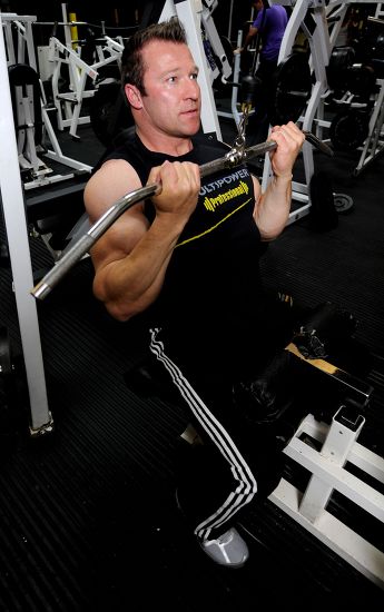 Bodybuilder Gunter Schlierkamp Demonstrates Lifting Technique Editorial ...