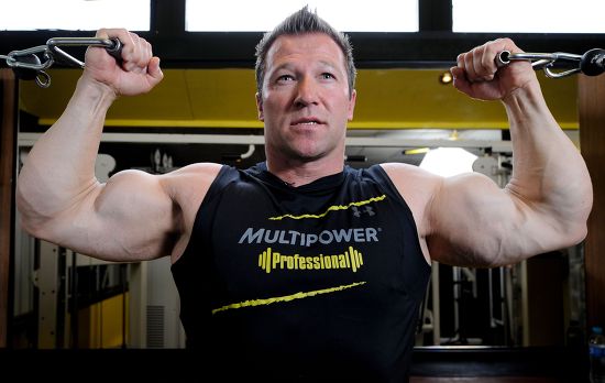 Bodybuilder Gunter Schlierkamp Demonstrates Lifting Technique Editorial ...