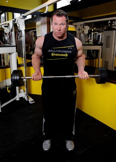 Bodybuilder Gunter Schlierkamp Demonstrates Lifting Technique Editorial ...