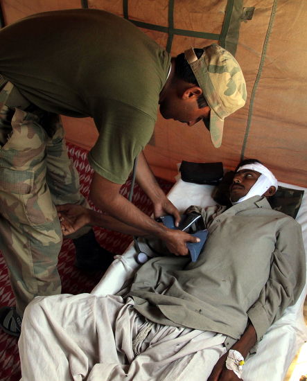 Pakistani Army Soldier Treats Sick Man Editorial Stock Photo - Stock ...