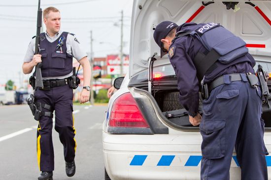 Police Officers Surround Building On Mountain Editorial Stock Photo ...