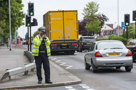 Traffic Officer Operates Handheld Speed Camera Editorial Stock Photo ...