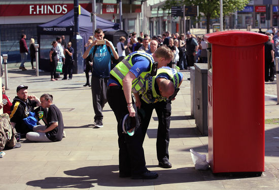 Two Police Officers Examine Unattended Package Editorial Stock Photo ...
