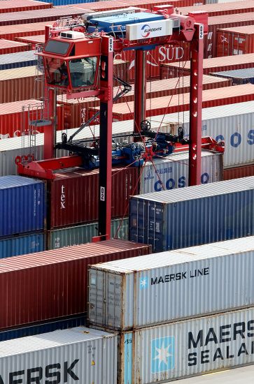 Container Carrier Maneuvers Between Lines Containers Editorial Stock ...