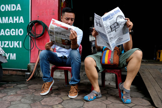 Two Men Read Newspapers Featuring Articles Editorial Stock Photo ...