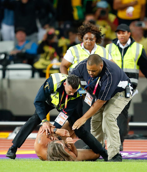 Security Personnel Tackle Pitch Invader During Editorial Stock Photo ...