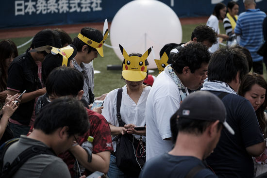 People Play Pokemon Go Game On Editorial Stock Photo - Stock Image ...