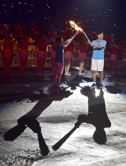 Torchbearer Xie Pingping L Wang Baoquan Editorial Stock Photo - Stock Image | Shutterstock