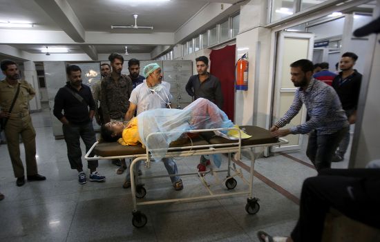 Wounded Woman Being Carried On Stretcher Editorial Stock Photo - Stock ...