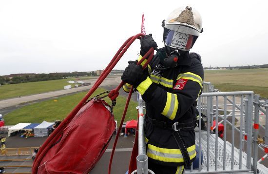 Fireman Pulls 19 Kg Bag During Editorial Stock Photo - Stock Image ...