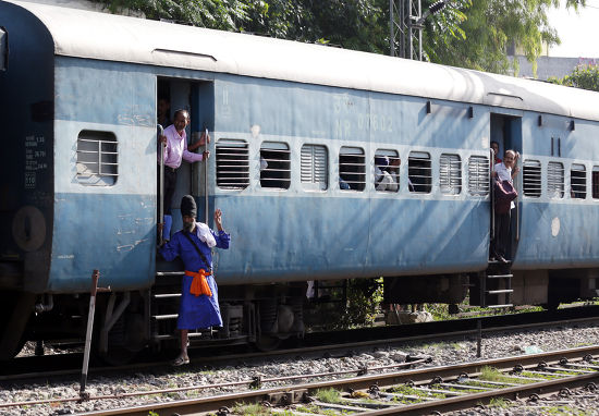 Indian Commuter Gets Off Slow Moving Editorial Stock Photo - Stock ...