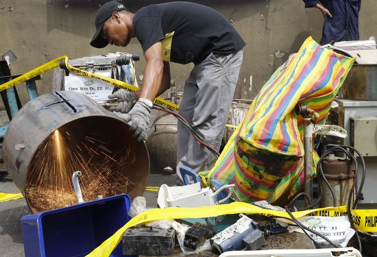 Worker Cuts Seized Equipment Used Manufacture Editorial Stock Photo ...