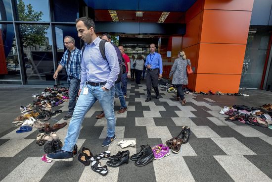 People Step Over Shoes Outside Border Editorial Stock Photo - Stock ...