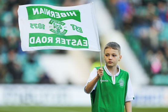 Young Hibernian Supporter Waves Flag During Editorial Stock Photo ...