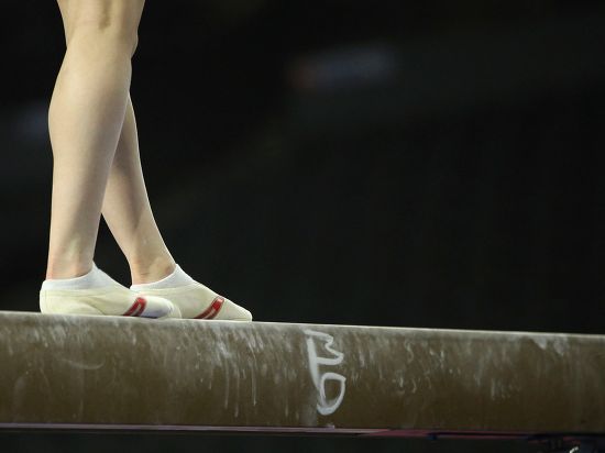 Gymnasts Feet Firmly On Beam During Editorial Stock Photo - Stock Image ...