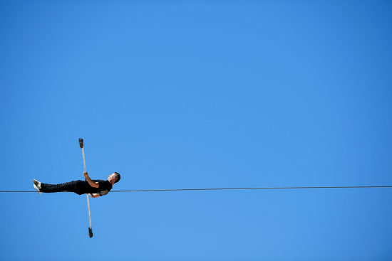 Acrobat Performs On Stretched Wire Rope Editorial Stock Photo - Stock ...