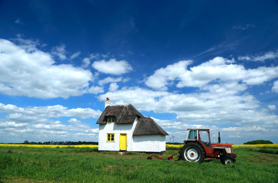 Tractor Cuts Grass Around Canary Cottage Editorial Stock Photo - Stock ...