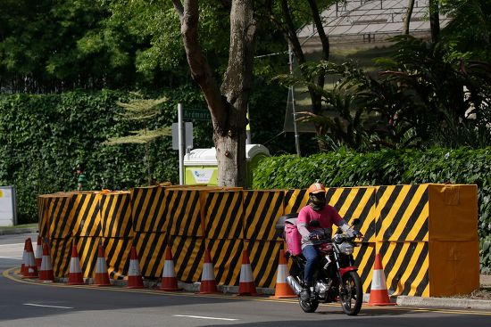 Motorcyclist Rides Past Concrete Barricades Set Editorial Stock Photo ...