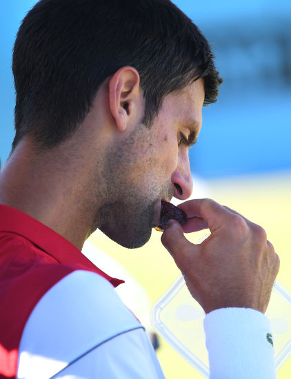 Novak Djokovic Nibbles On Prune Between Editorial Stock Photo - Stock ...