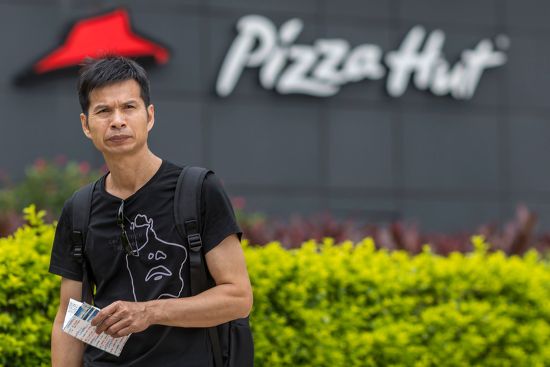 Man Walks Front Pizza Hut Restaurant Editorial Stock Photo - Stock ...