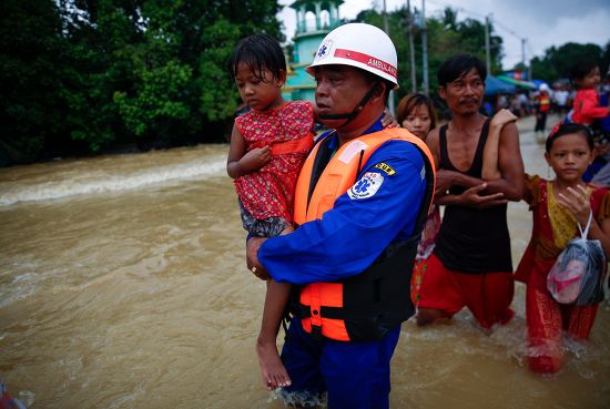 Rescuer Carries Child He Helps People Editorial Stock Photo - Stock ...