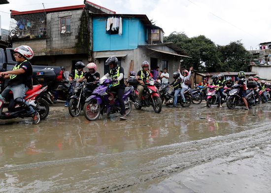 Filipino Motorcycle Riders Maneuver Along Muded Editorial Stock Photo ...