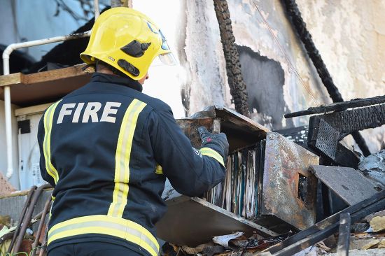 Firefighter Examines Burnt Filing Cabinet Site Editorial Stock Photo ...