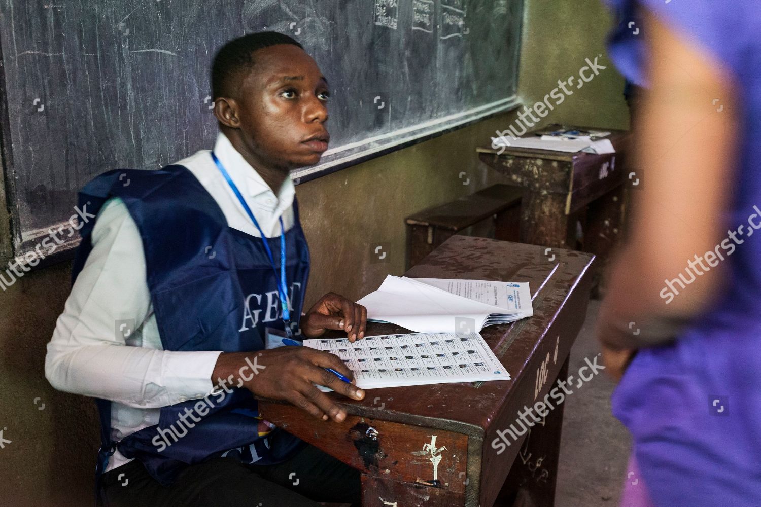 Election Clerk Looks On Inside Polling Editorial Stock Photo - Stock ...