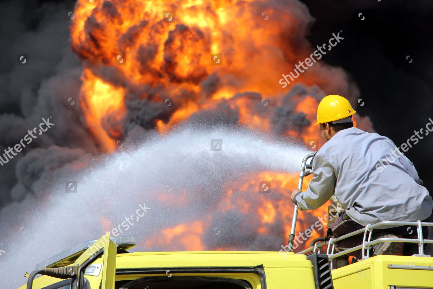 Firefighter Tries Extinguish Fire Oil Storage Editorial Stock Photo ...