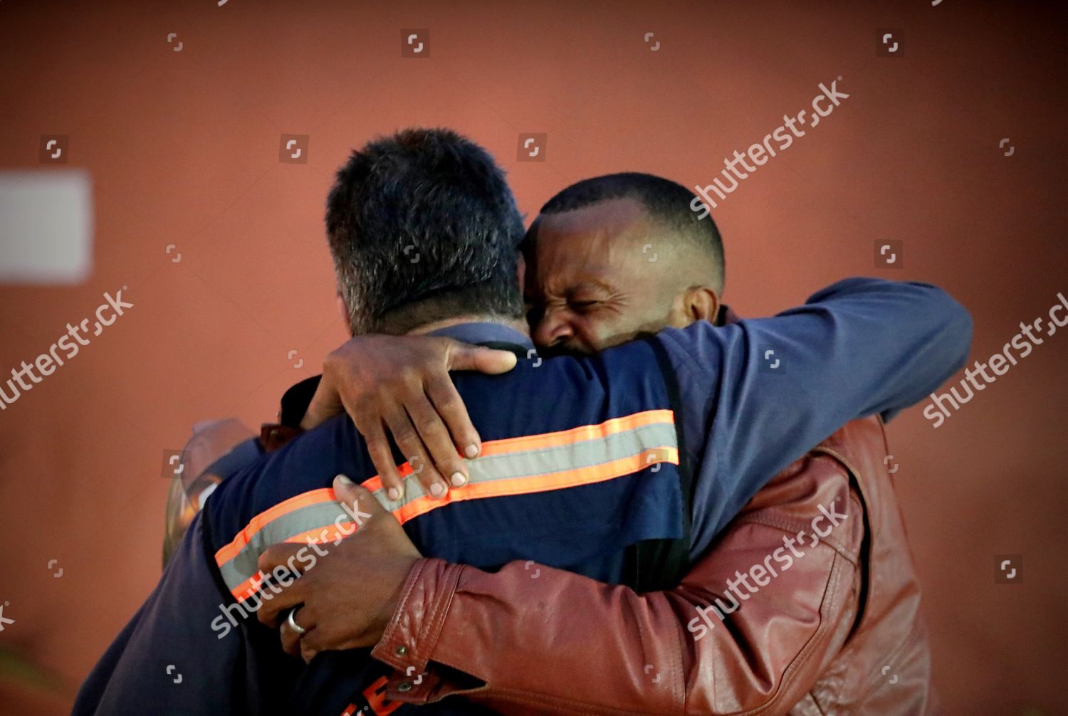 Two Family Members Embrace After Disaster Editorial Stock Photo - Stock ...