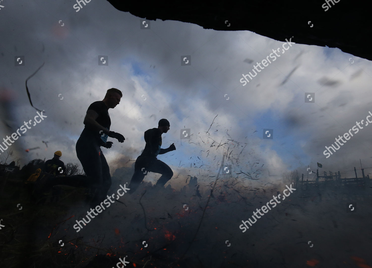 Competitors Jump Through Fire During Tough Editorial Stock Photo ...