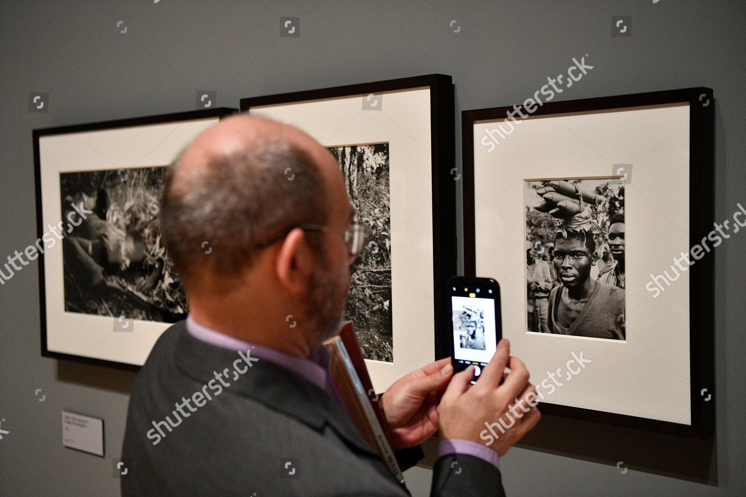 Man Views Work By British Photographer Editorial Stock Photo - Stock ...