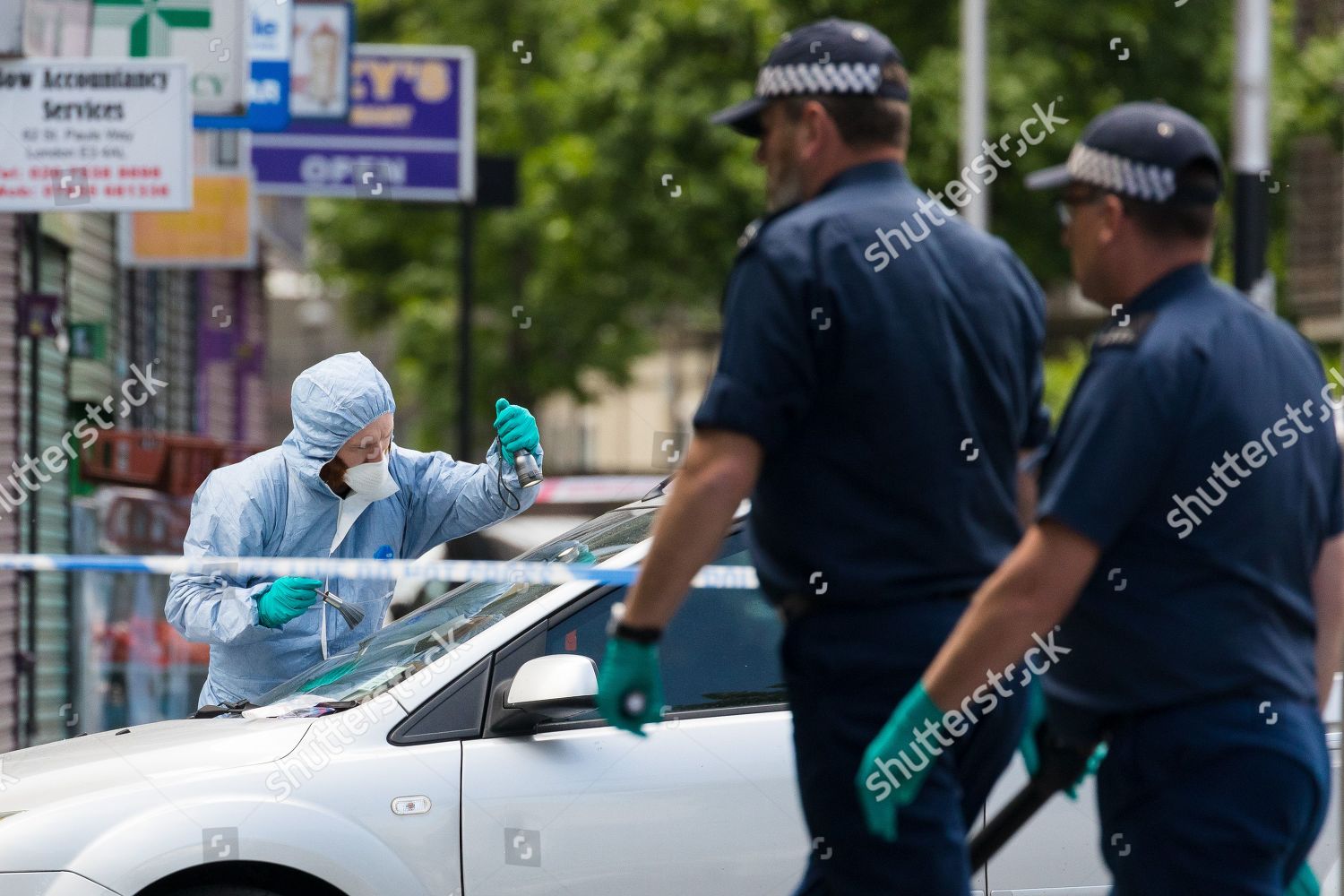 Police Forensic Officer Taking Fingerprint Samples Editorial Stock ...