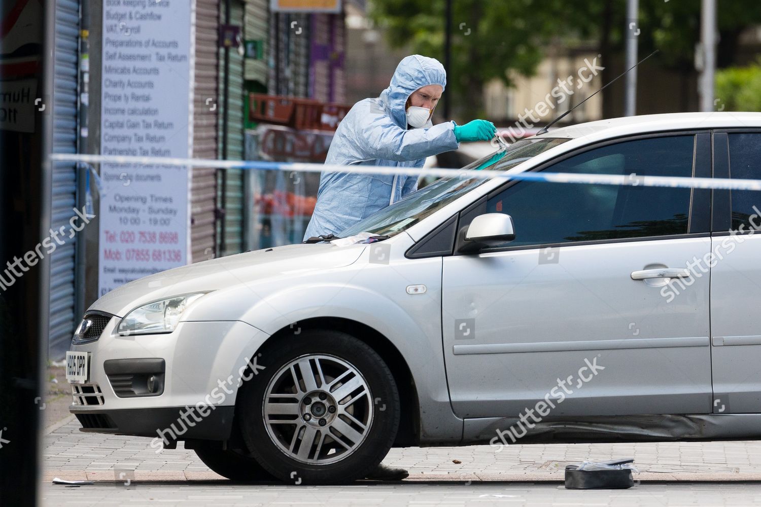 Police Forensic Officer Taking Fingerprint Samples Editorial Stock ...