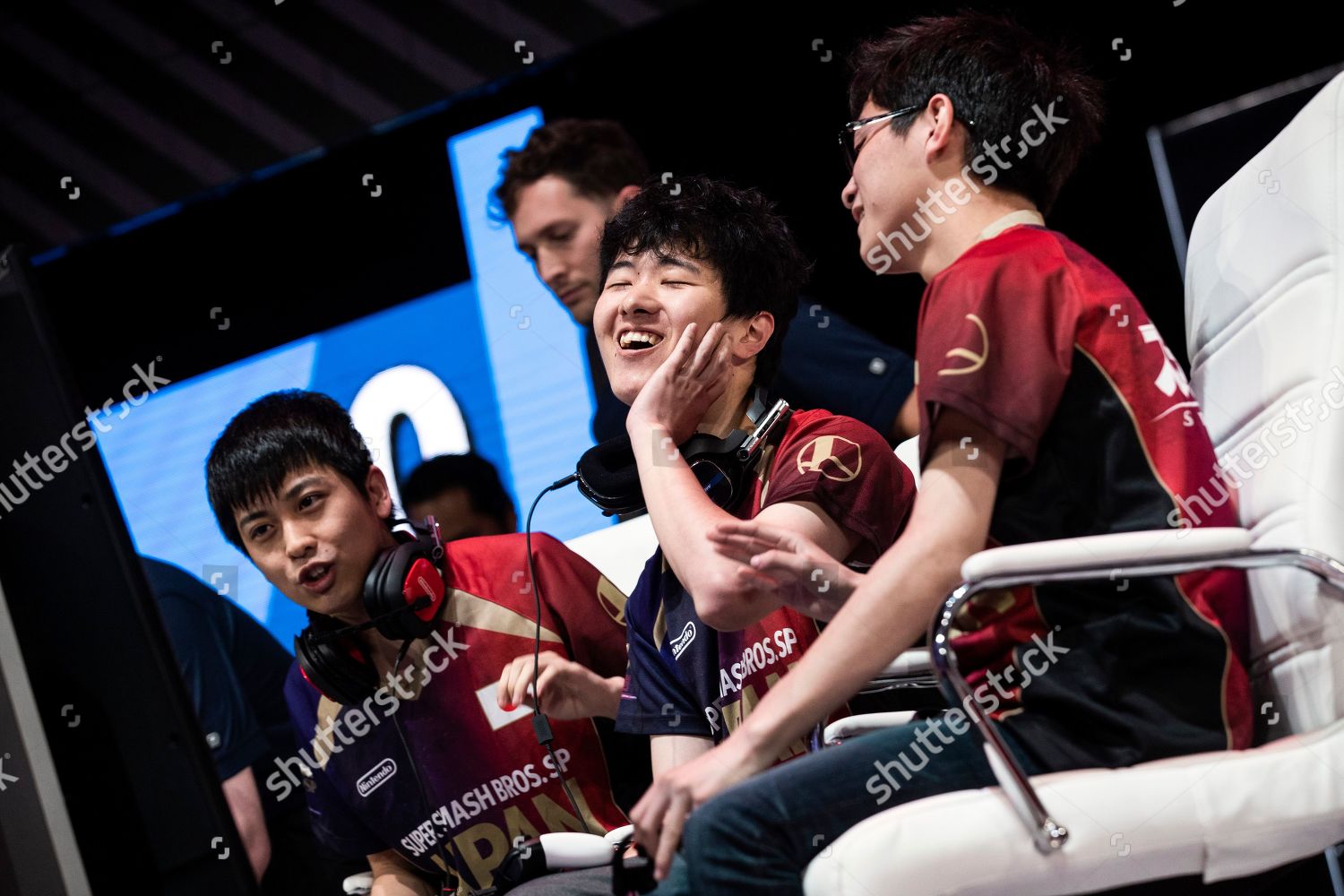 Japanese Team Members React During Their Editorial Stock Photo - Stock ...