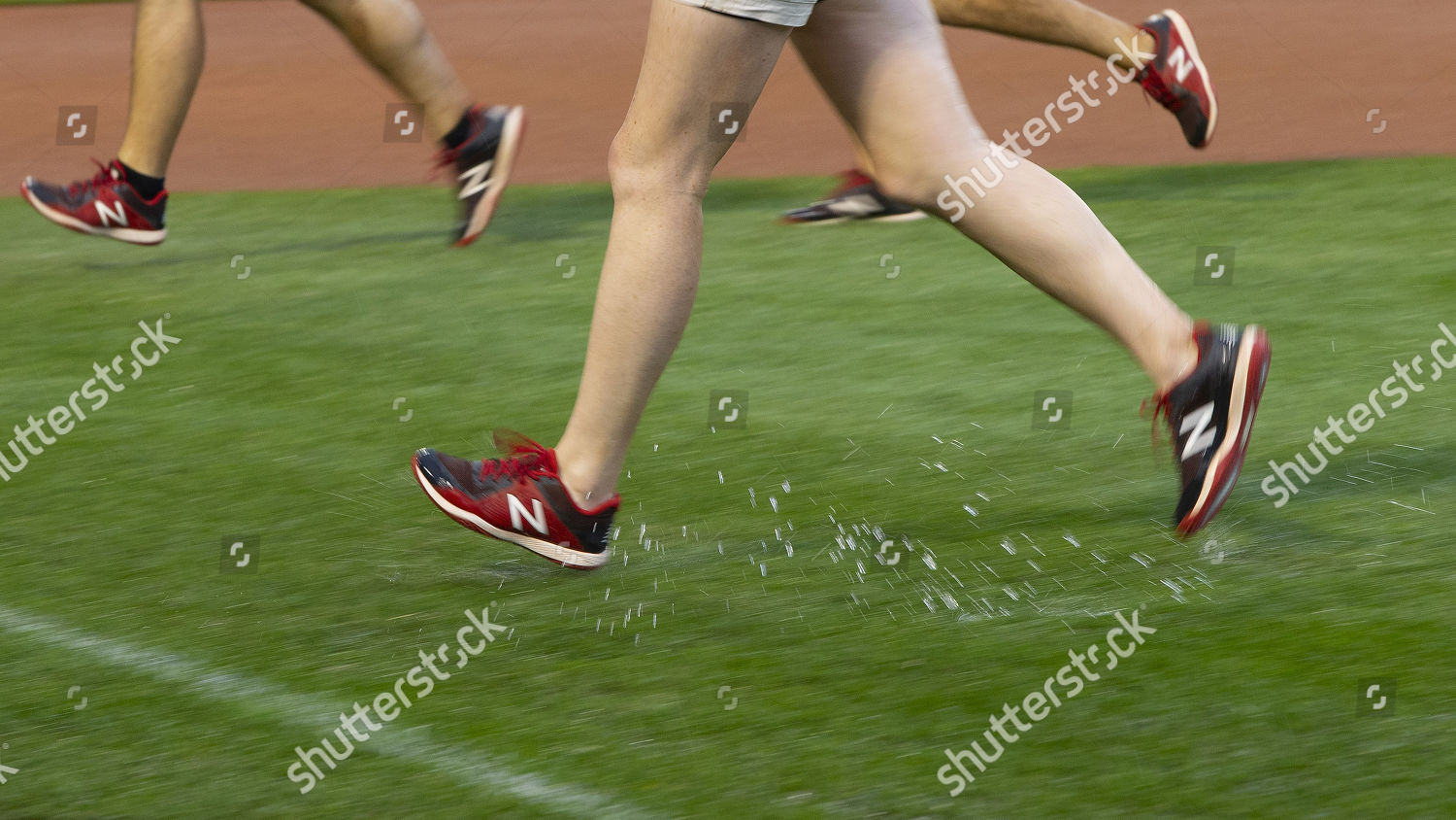 Field Crew Members Run Across Wet Editorial Stock Photo - Stock Image ...