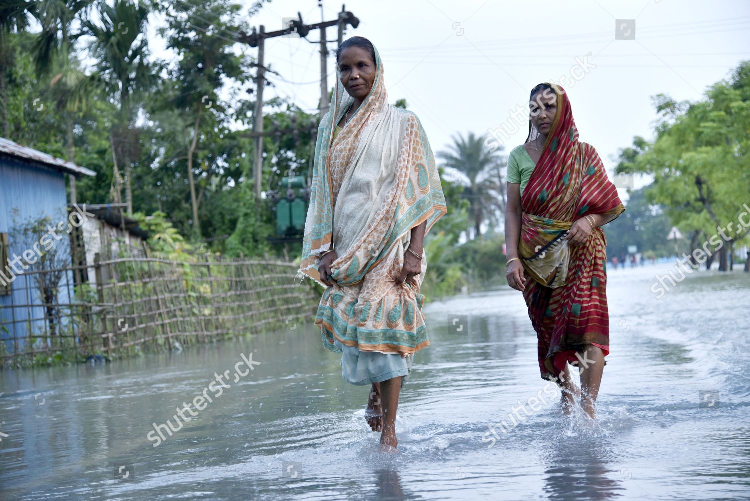 Women Walking Through Flood Water Floodaffected Editorial Stock Photo ...