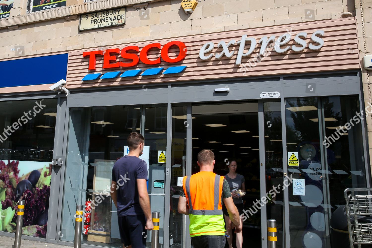 Shoppers Outside Tesco Express On Green Editorial Stock Photo - Stock ...