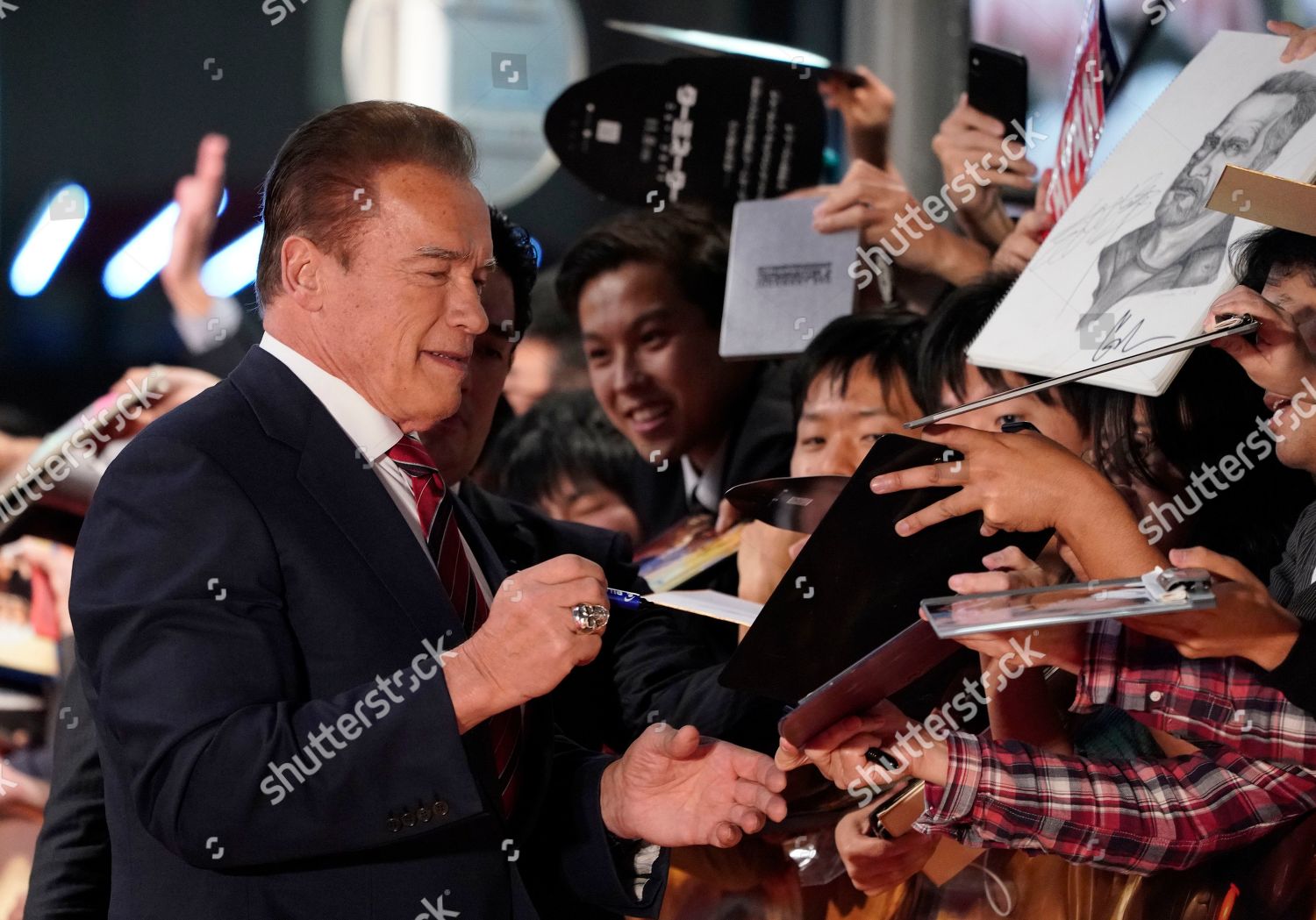 Arnold Schwarzenegger Signs Autographs Fans During Editorial Stock ...