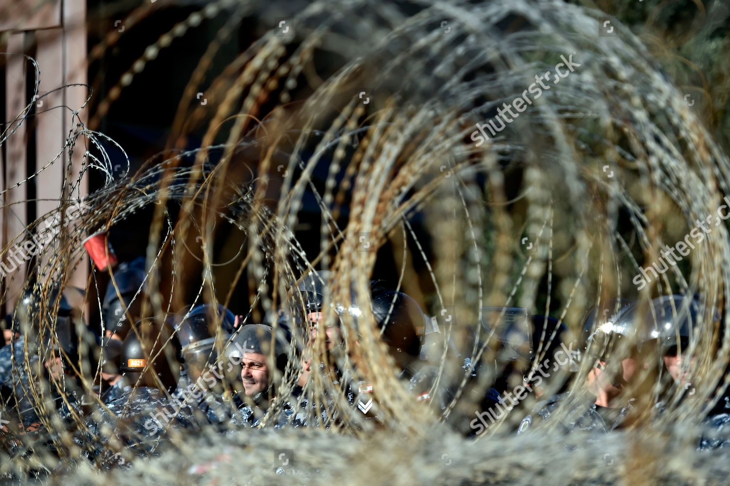 Riot Police Behind Barbed Wire Blocking Editorial Stock Photo - Stock ...