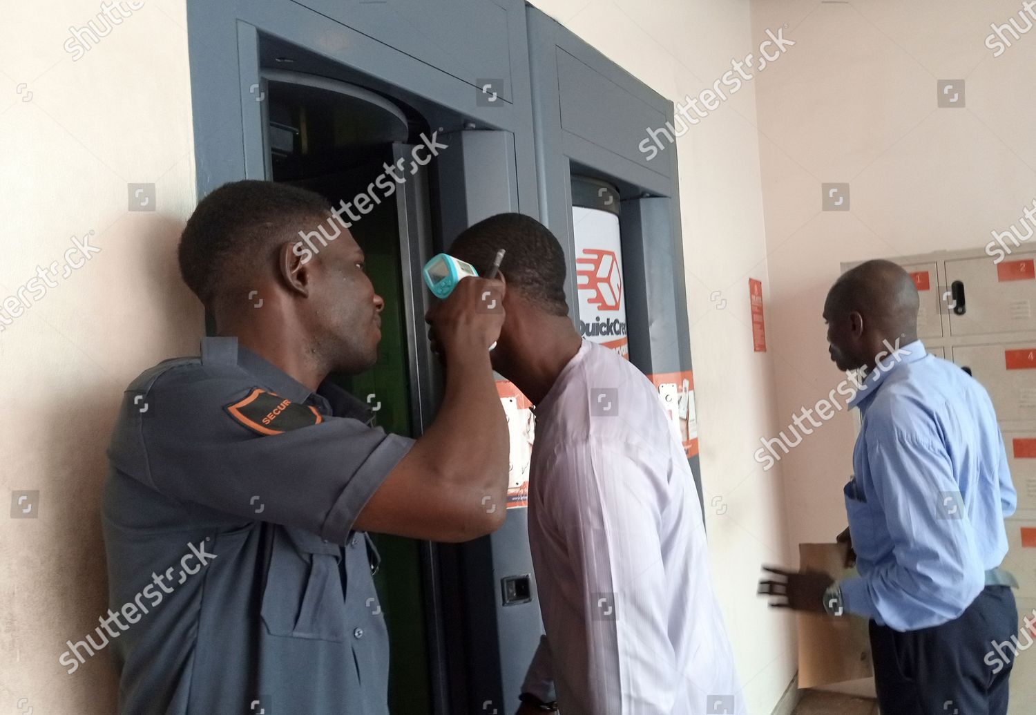 Nigerian Security Guard Checks Temperature Client Editorial Stock Photo ...