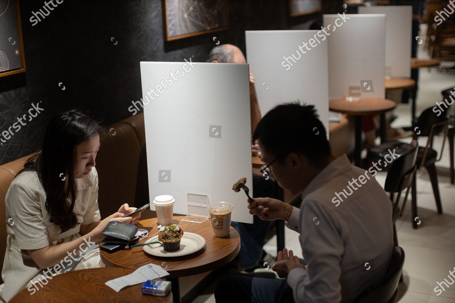 Patrons Sit Partitioned Tables Inside Starbucks Editorial Stock Photo ...