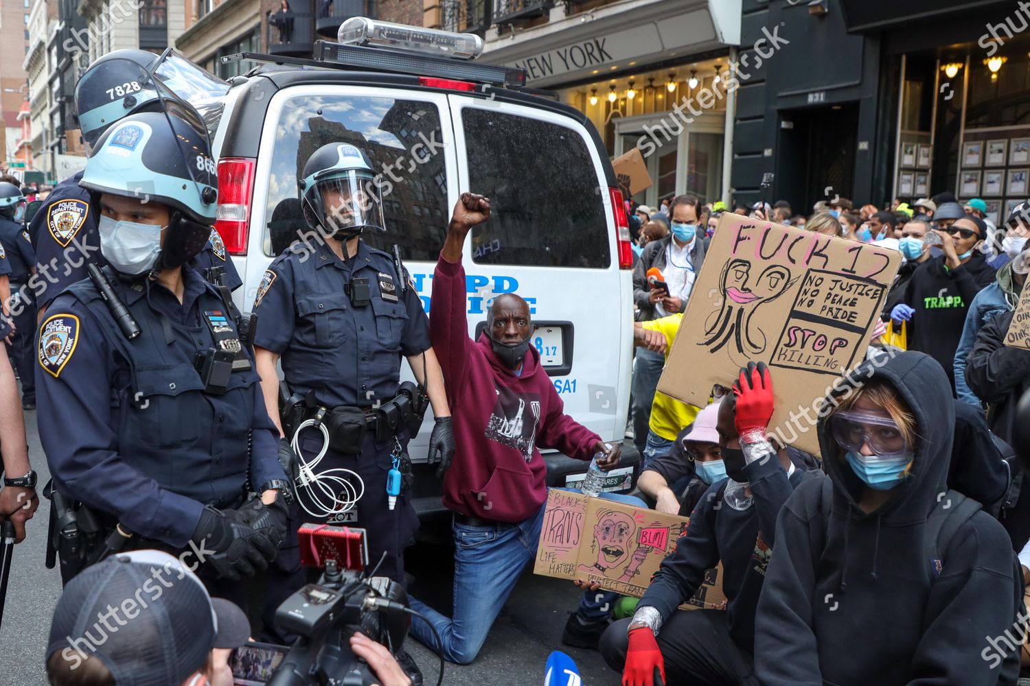 Police Officers Kneeling Beside Black Man Editorial Stock Photo - Stock ...