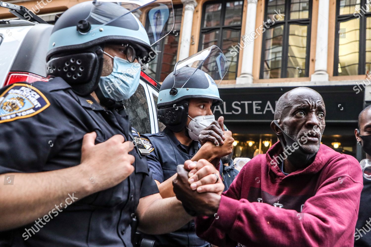 Police Officers Kneeling Beside Black Man Editorial Stock Photo - Stock ...